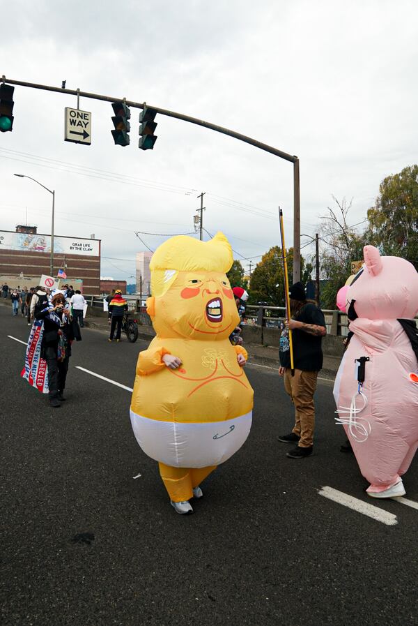 Frog March Against President Trump Draws Tens of Thousands to Downtown ...